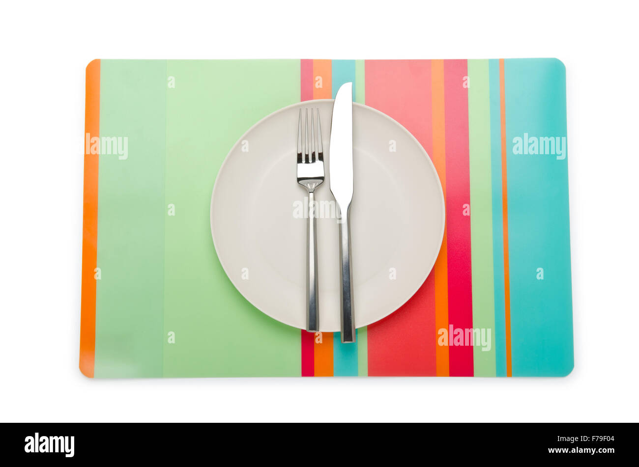 Plate and utensils served on table Stock Photo - Alamy