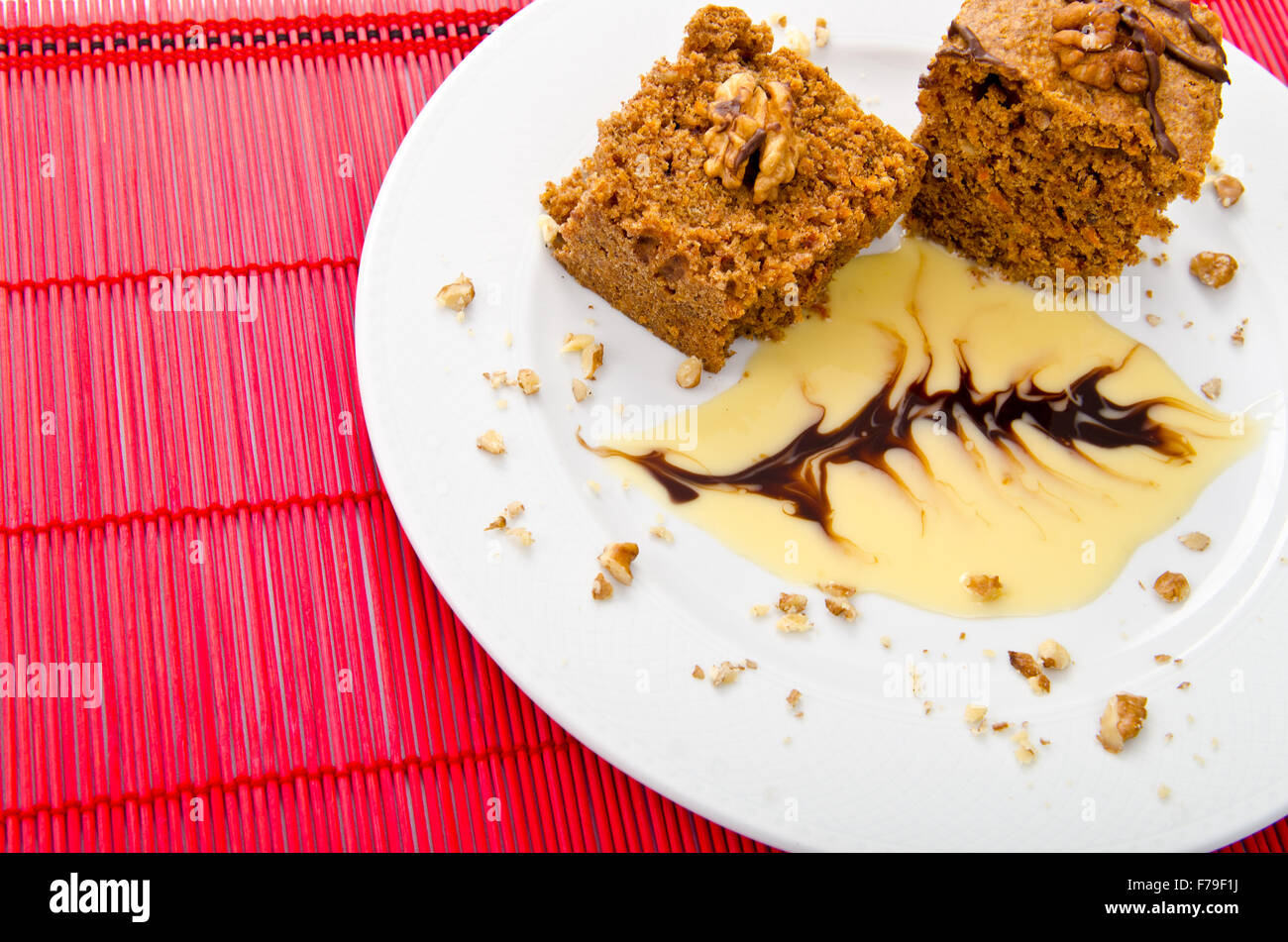Cake with sweet sauce in plate Stock Photo - Alamy