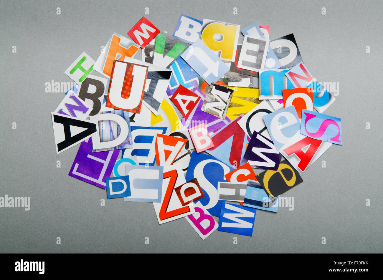 Newspaper clippings with various letters Stock Photo - Alamy