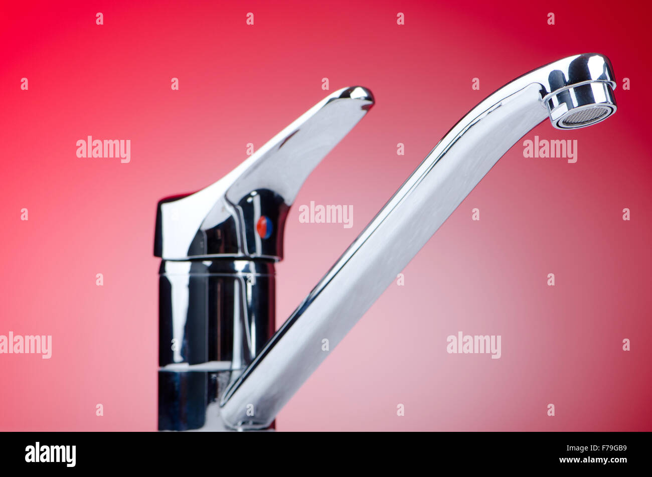 Chrome tap against the background Stock Photo - Alamy
