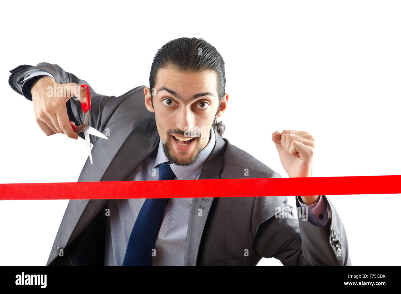Businessman crossing finish line Stock Photo - Alamy