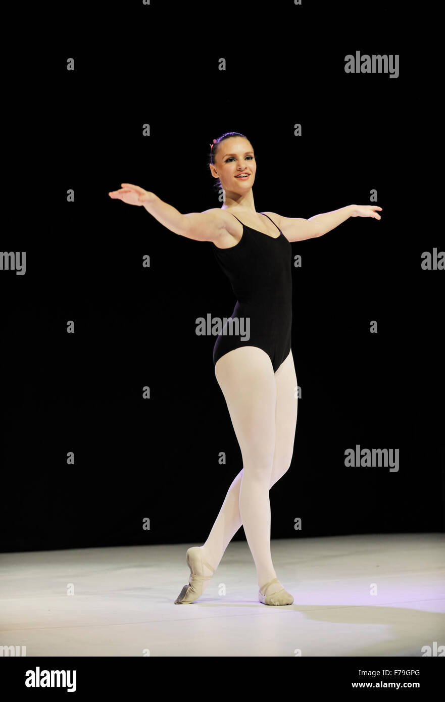 young happy ballet girl ballerina perform dance on stage at ballet ...
