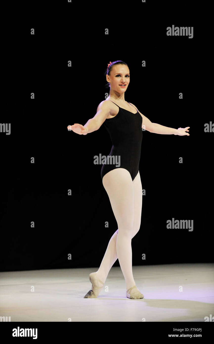 young happy ballet girl ballerina perform dance on stage at ballet ...