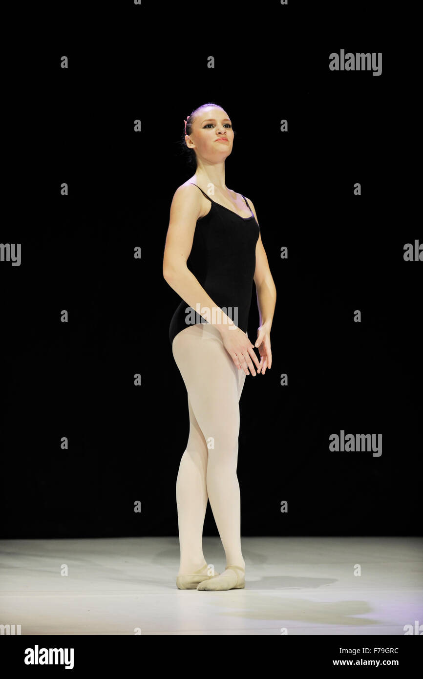 young happy ballet girl ballerina perform dance on stage at ballet ...