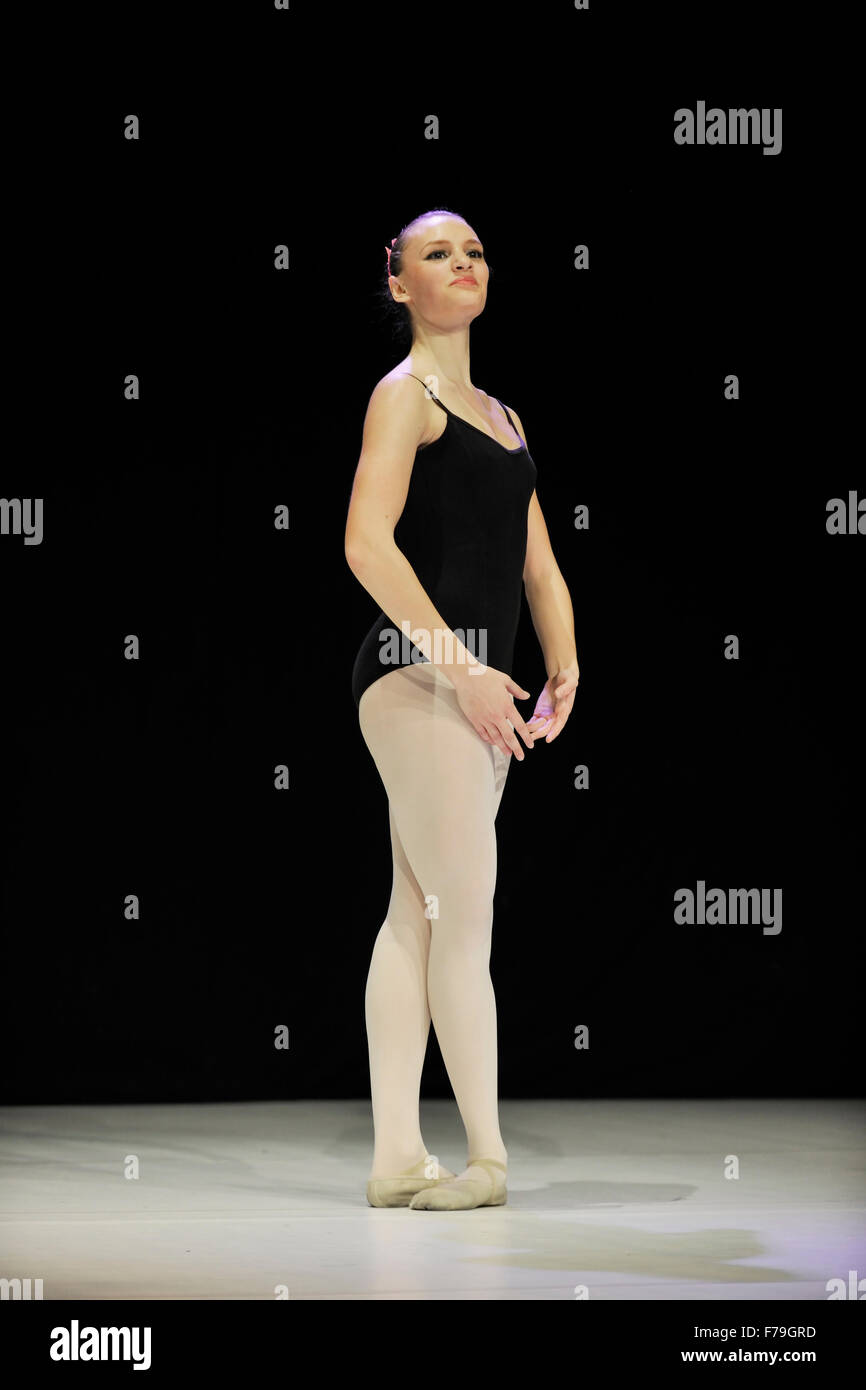 young happy ballet girl ballerina perform dance on stage at ballet ...