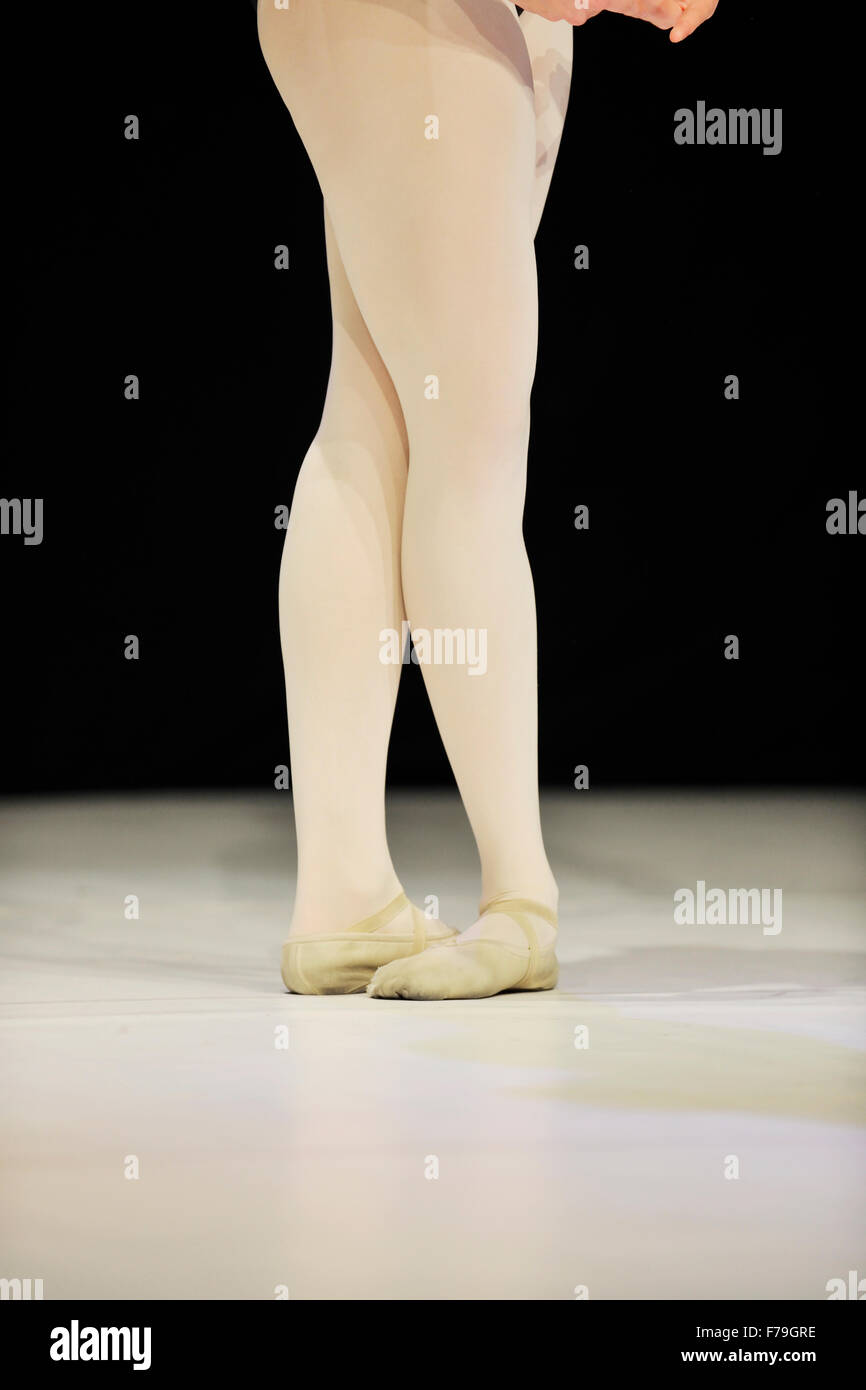 young happy ballet girl ballerina perform dance on stage at ballet ...