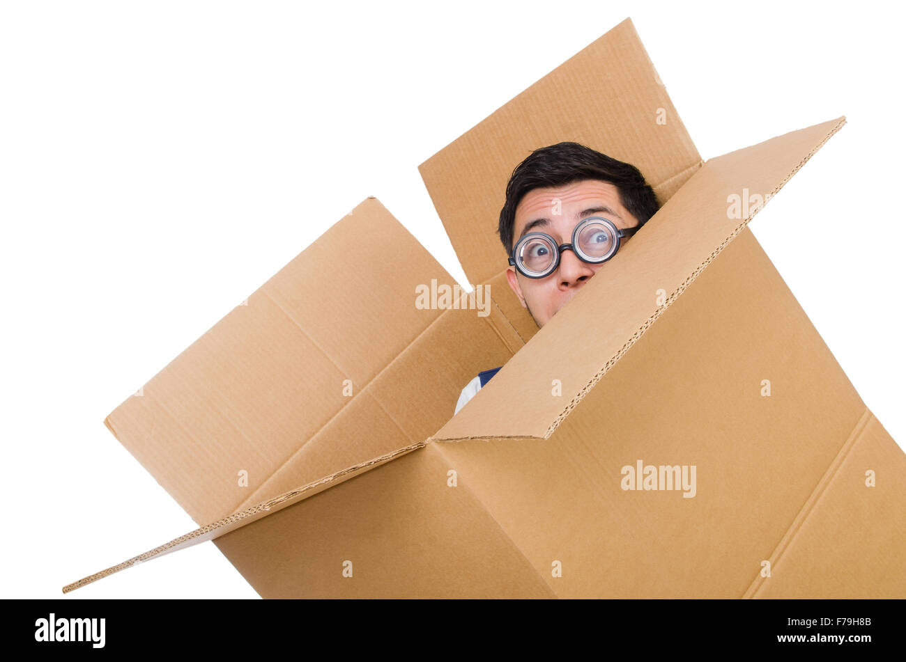 Man in thinking outside the box concept Stock Photo - Alamy