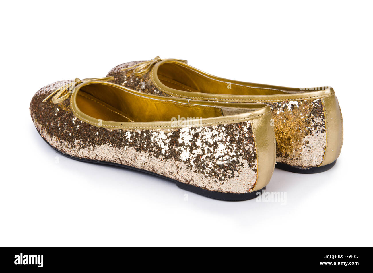 Golden ballet shoes isolated on white Stock Photo - Alamy