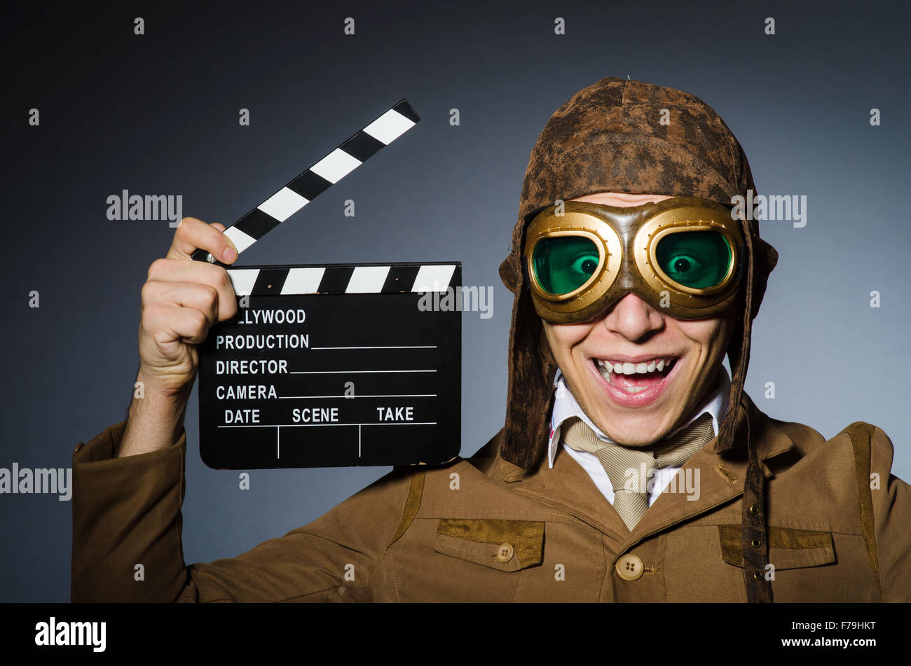 Funny pilot with goggles and helmet Stock Photo - Alamy