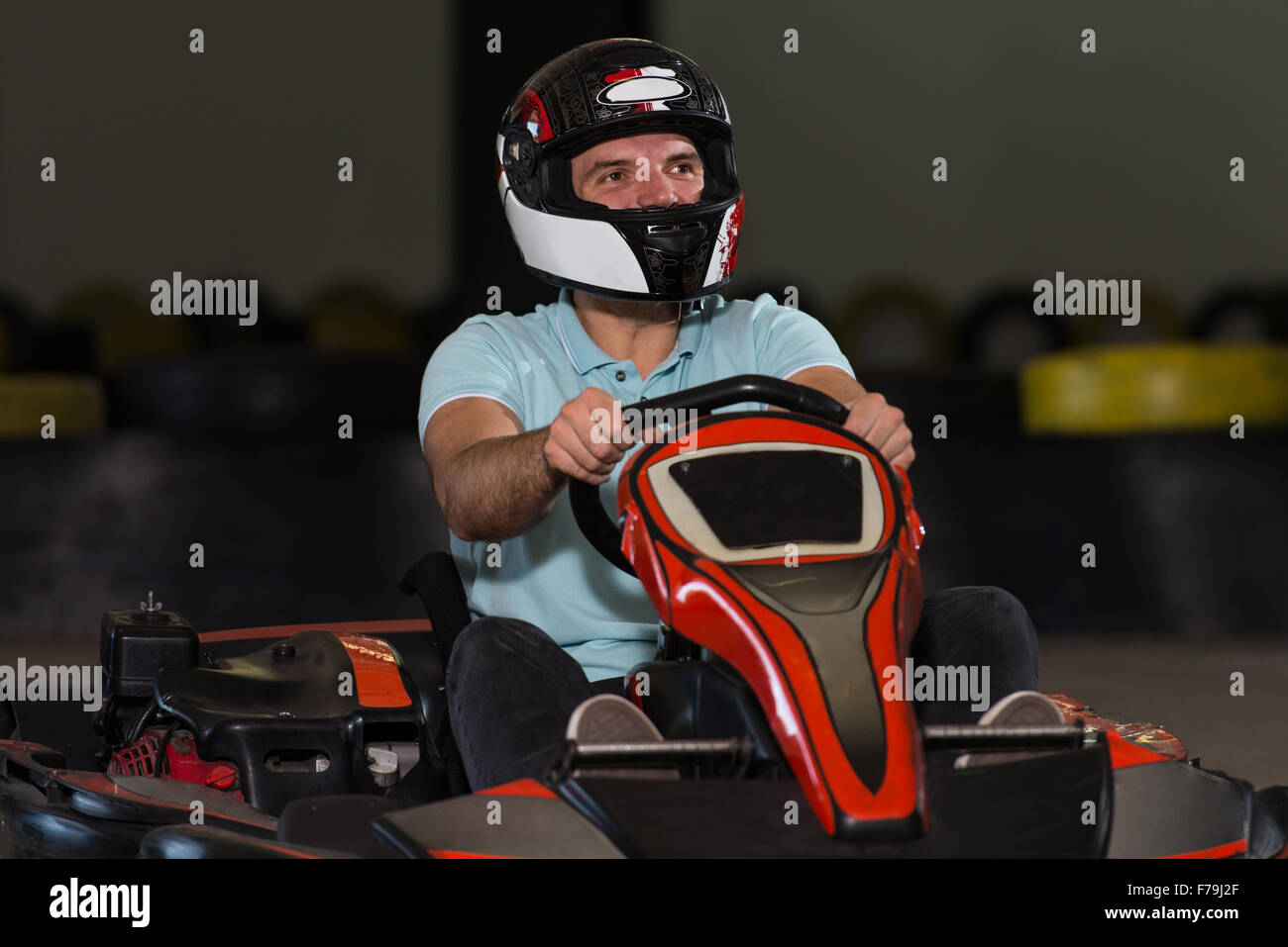 Young Man Is Driving Go-Kart Car With Speed In A Playground Racing ...