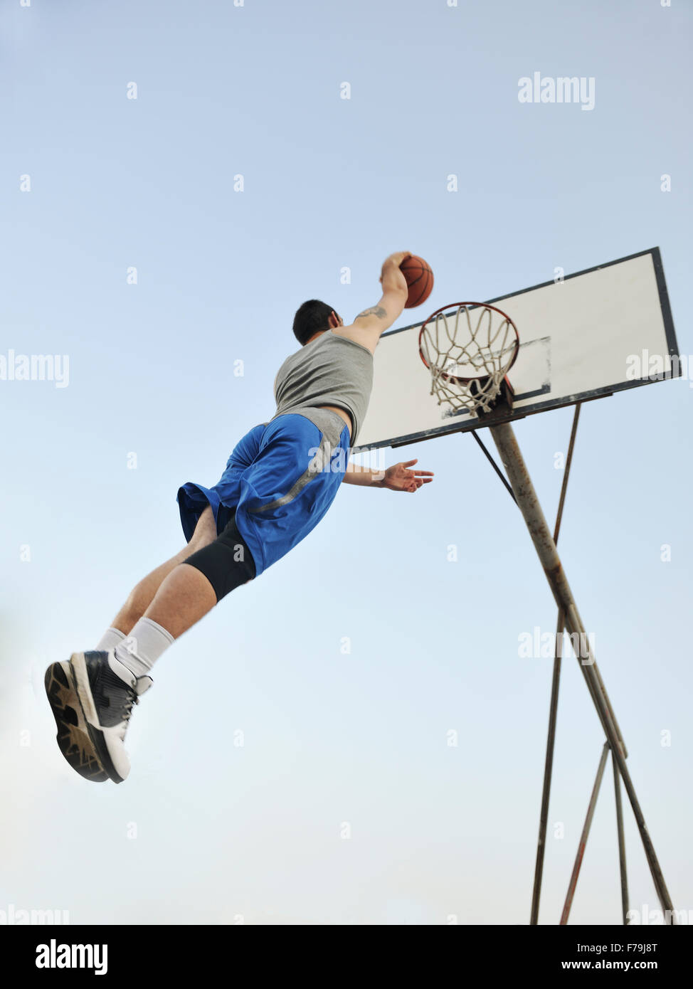 basketball player practicing and posing for basketball and sports ...