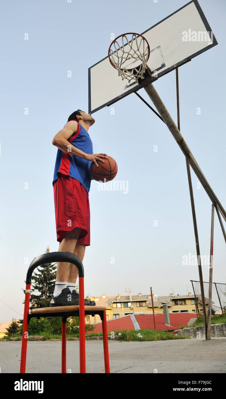 basketball player practicing and posing for basketball and sports ...