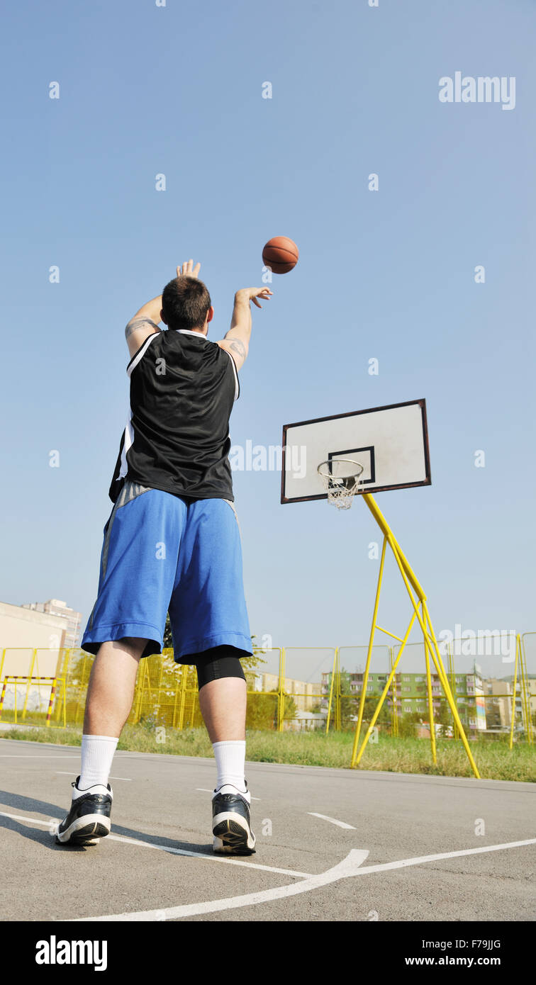 basketball player practicing and posing for basketball and sports ...