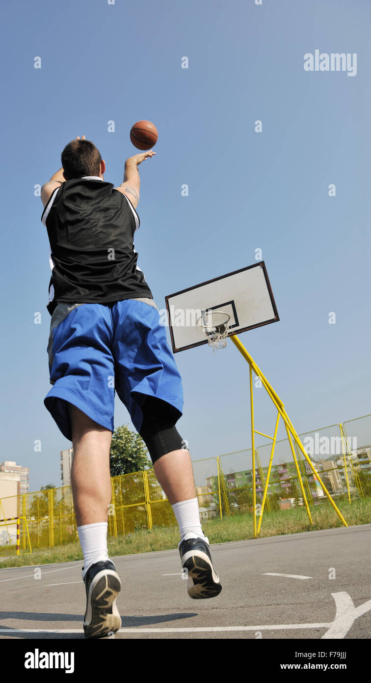basketball player practicing and posing for basketball and sports ...