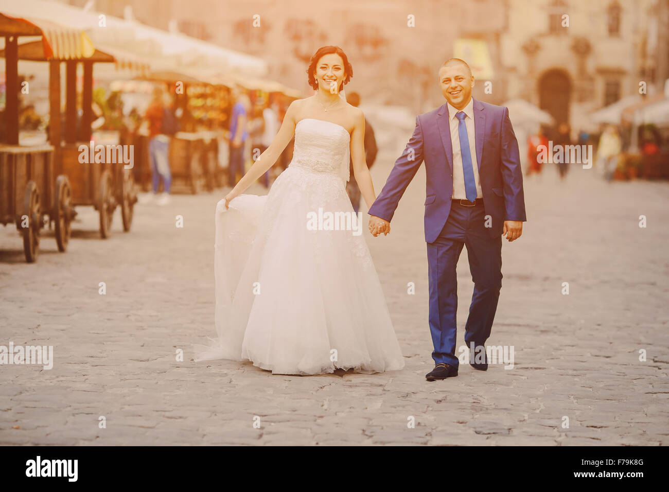 Wedding couple walking Stock Photo - Alamy