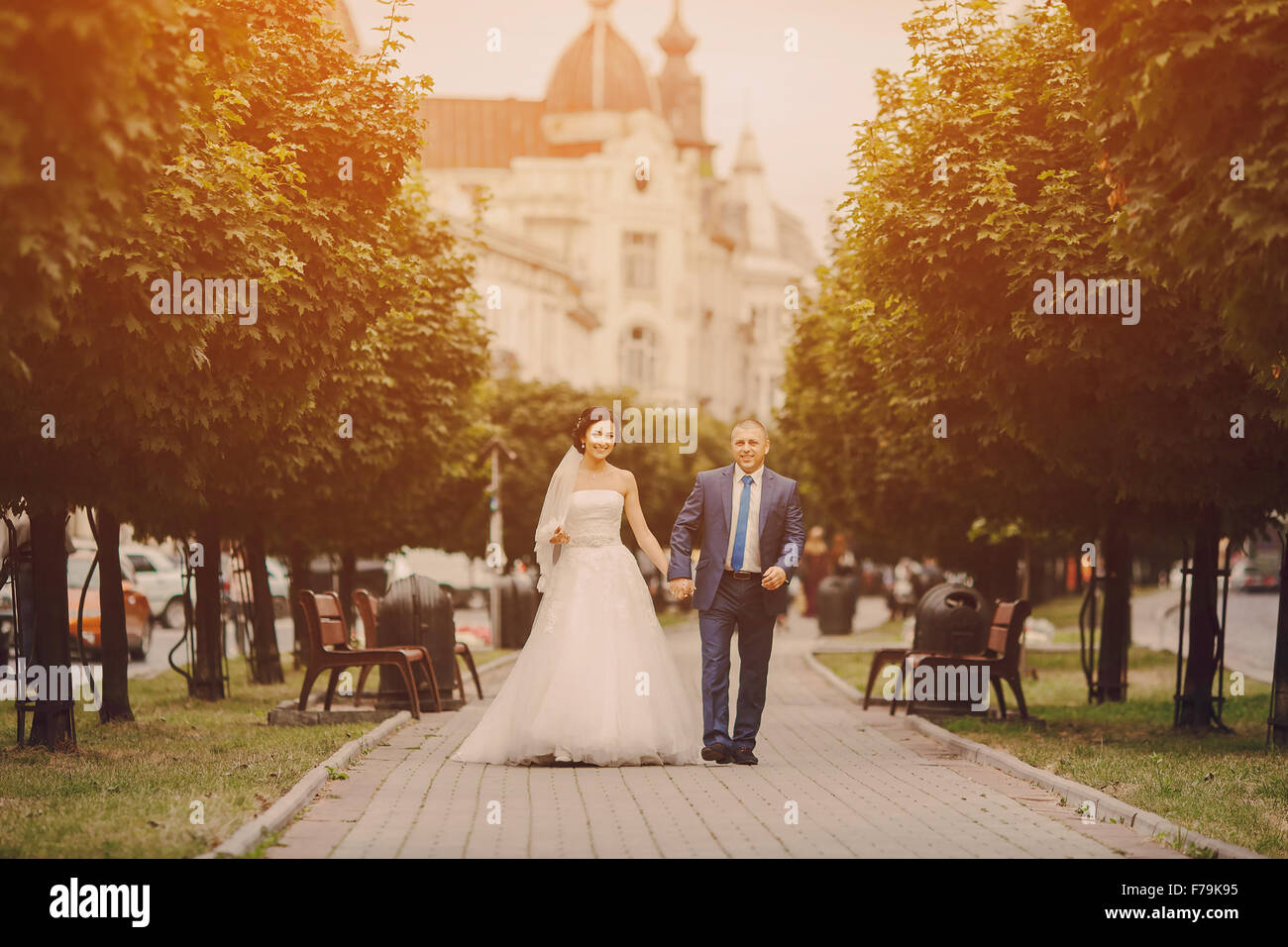 Wedding couple walking Stock Photo - Alamy