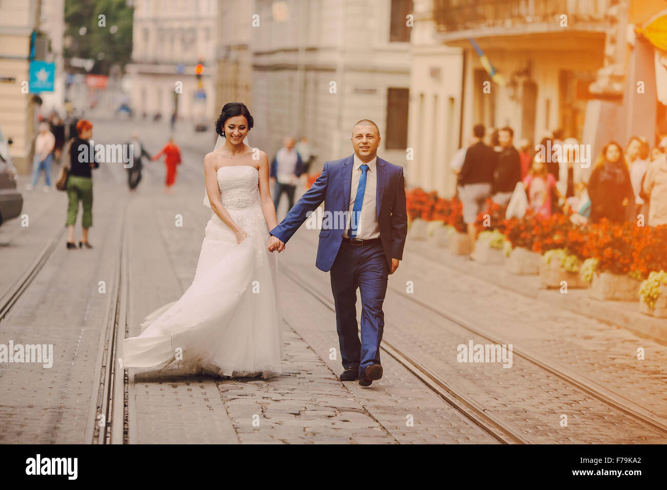 Wedding couple walking Stock Photo - Alamy