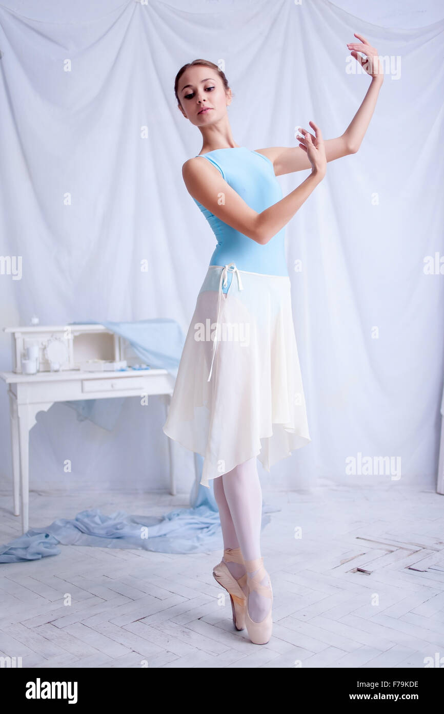 Professional ballet dancer posing on white Stock Photo - Alamy