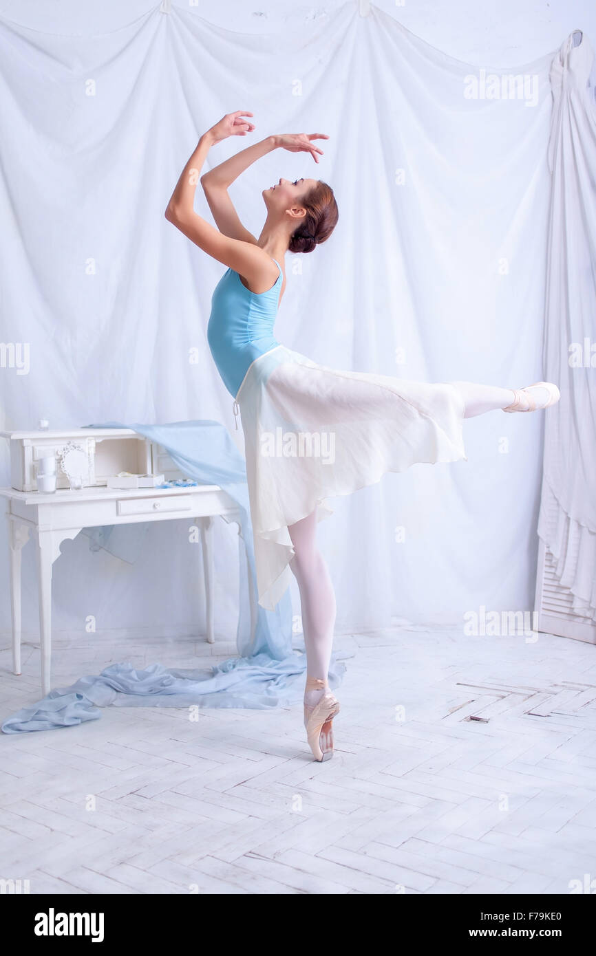 Professional ballet dancer posing on white Stock Photo - Alamy