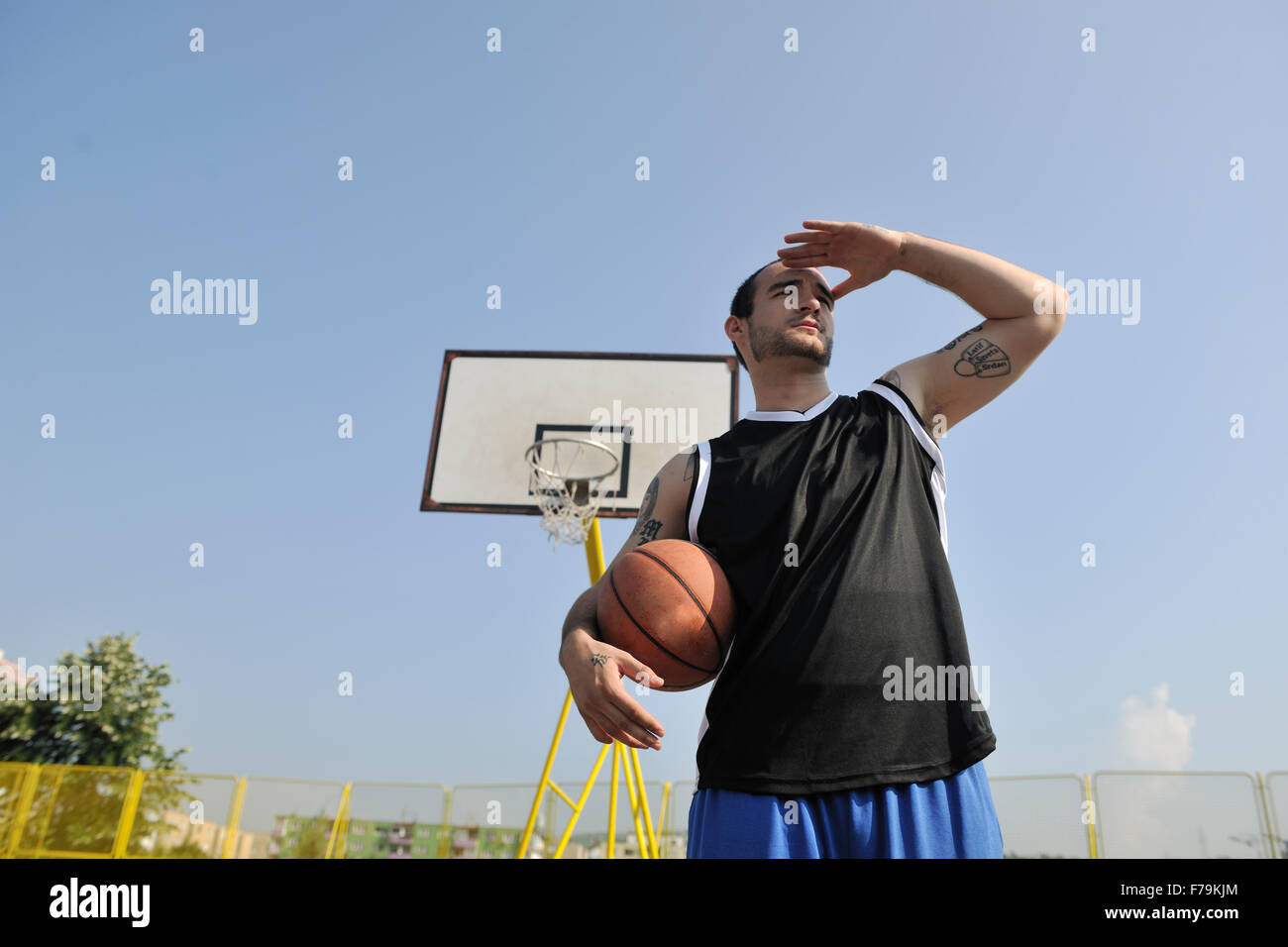 basketball player practicing and posing for basketball and sports ...