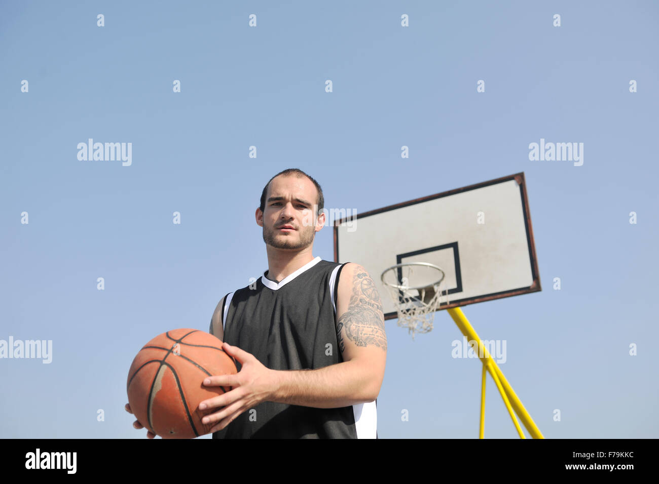 basketball player practicing and posing for basketball and sports ...