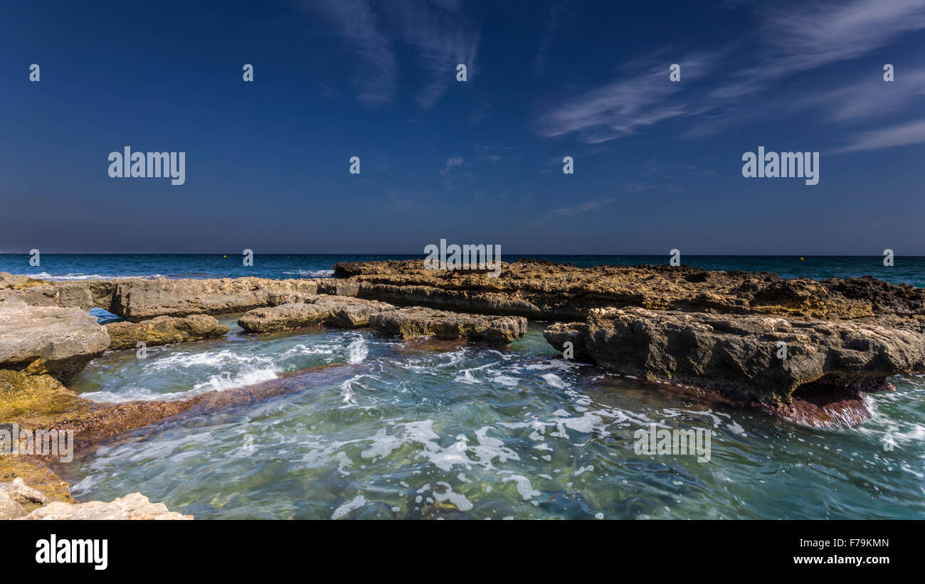 image of the coast of Alicante in Spain with rocks and the ...