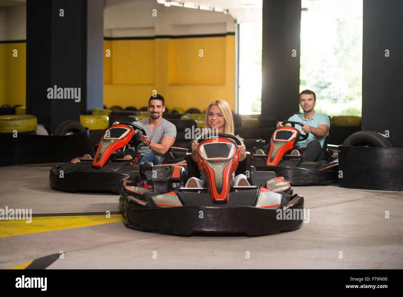 Group Of People Is Driving Go-Kart Car With Speed In A Playground ...