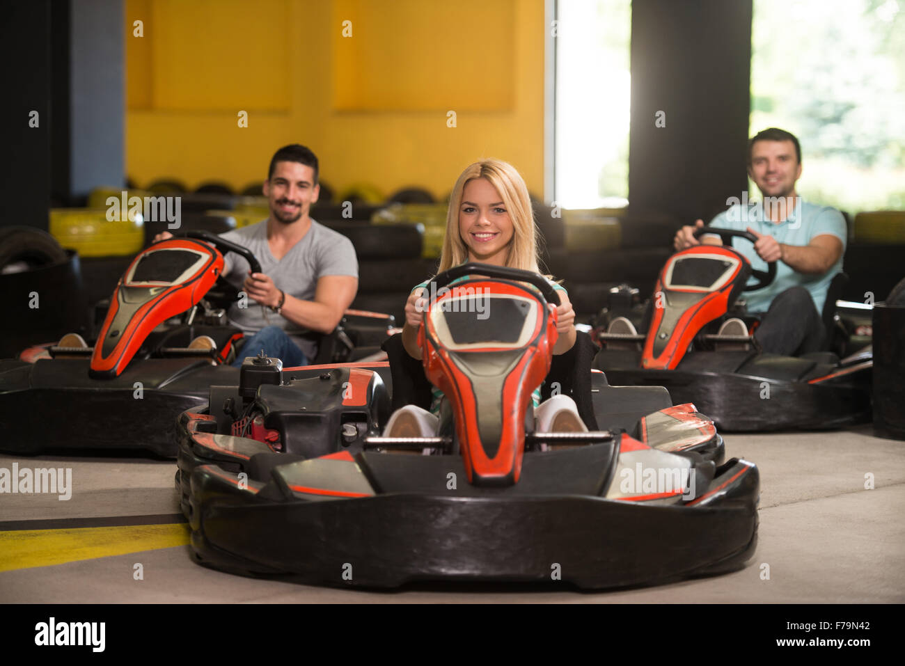 Group Of People Is Driving Go-Kart Car With Speed In A Playground ...