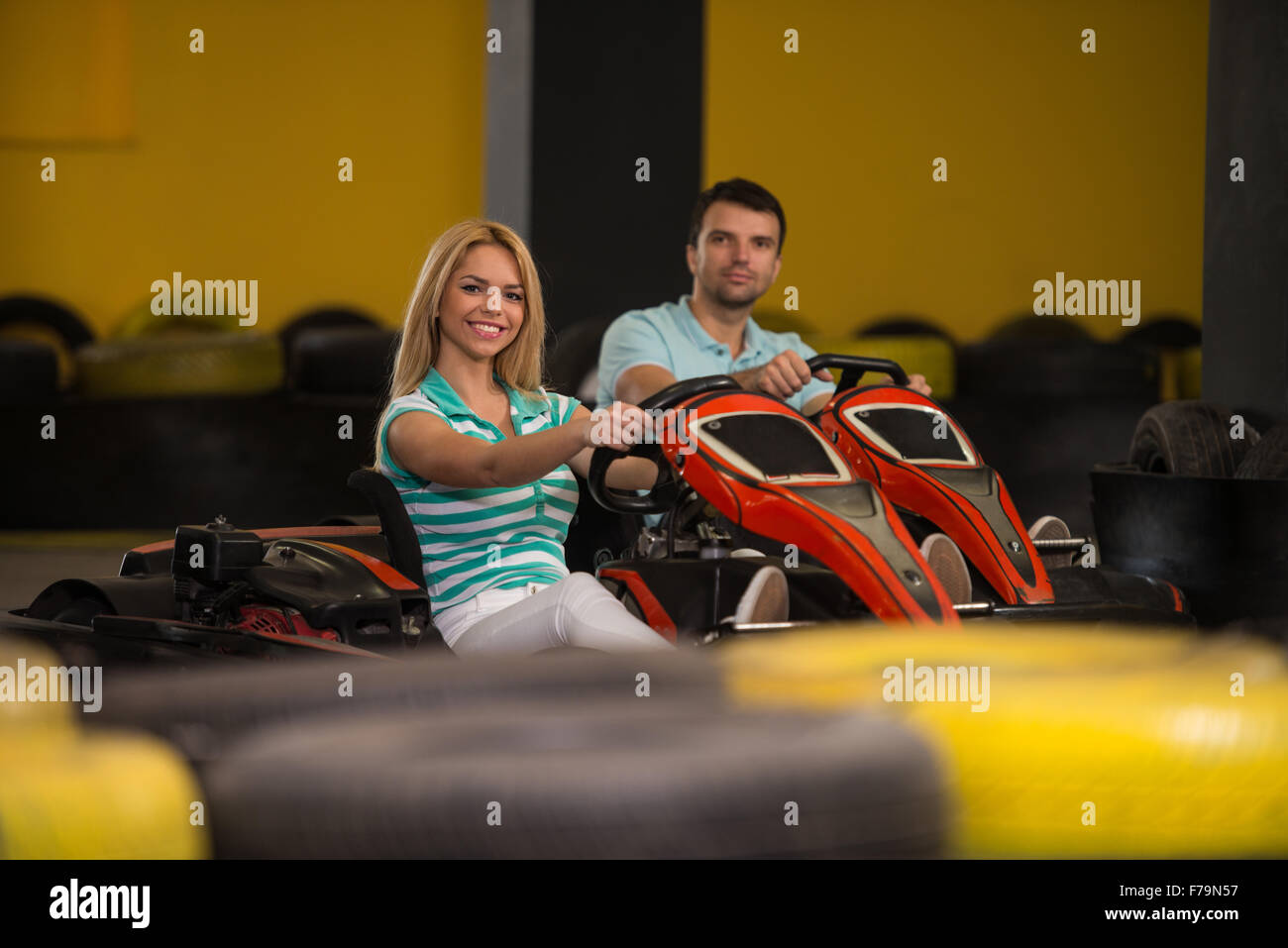 Group Of People Is Driving Go-Kart Car With Speed In A Playground ...