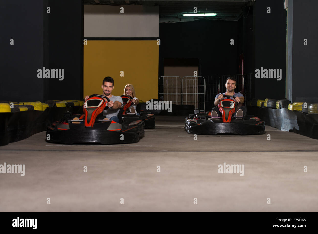 Group Of People Is Driving Go-Kart Car With Speed In A Playground ...