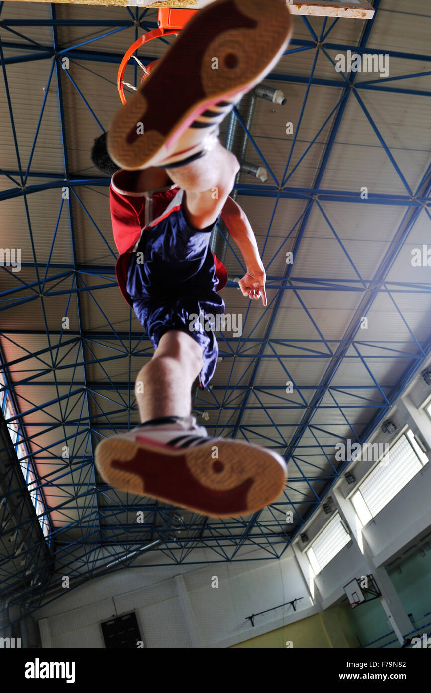 young healthy man play basketball game indoor in gym Stock Photo - Alamy