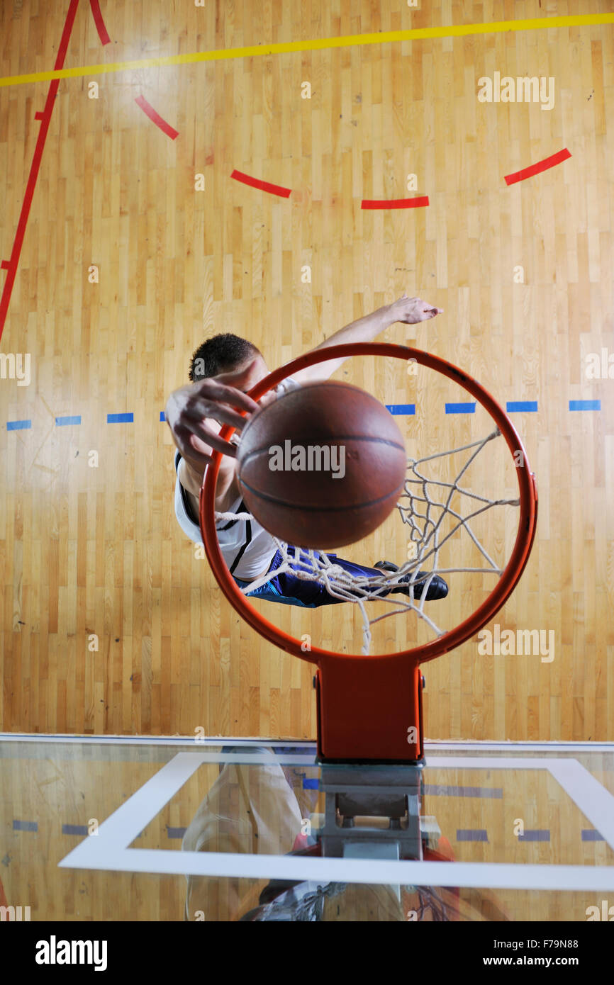 young healthy man play basketball game indoor in gym Stock Photo - Alamy