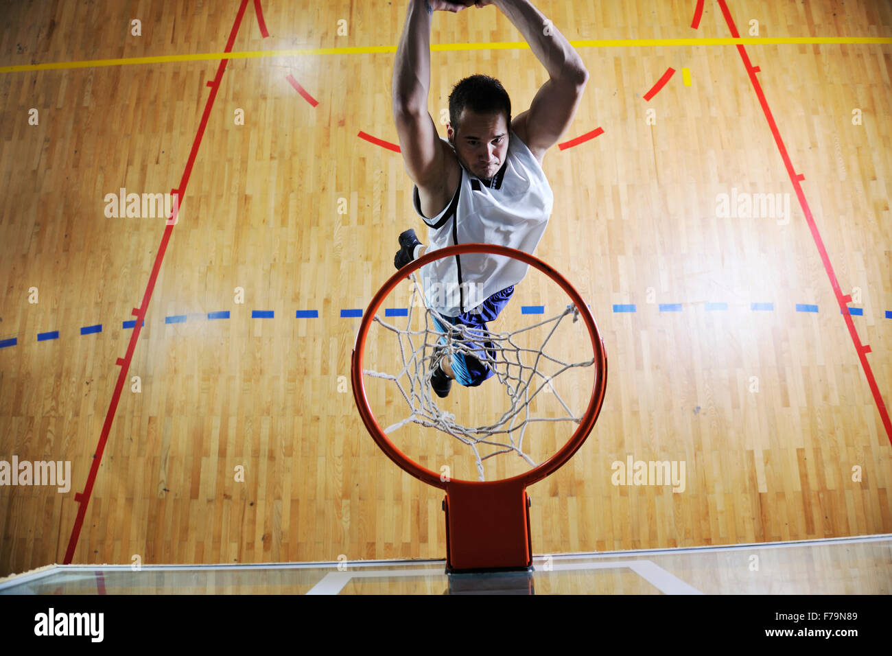 young healthy man play basketball game indoor in gym Stock Photo - Alamy