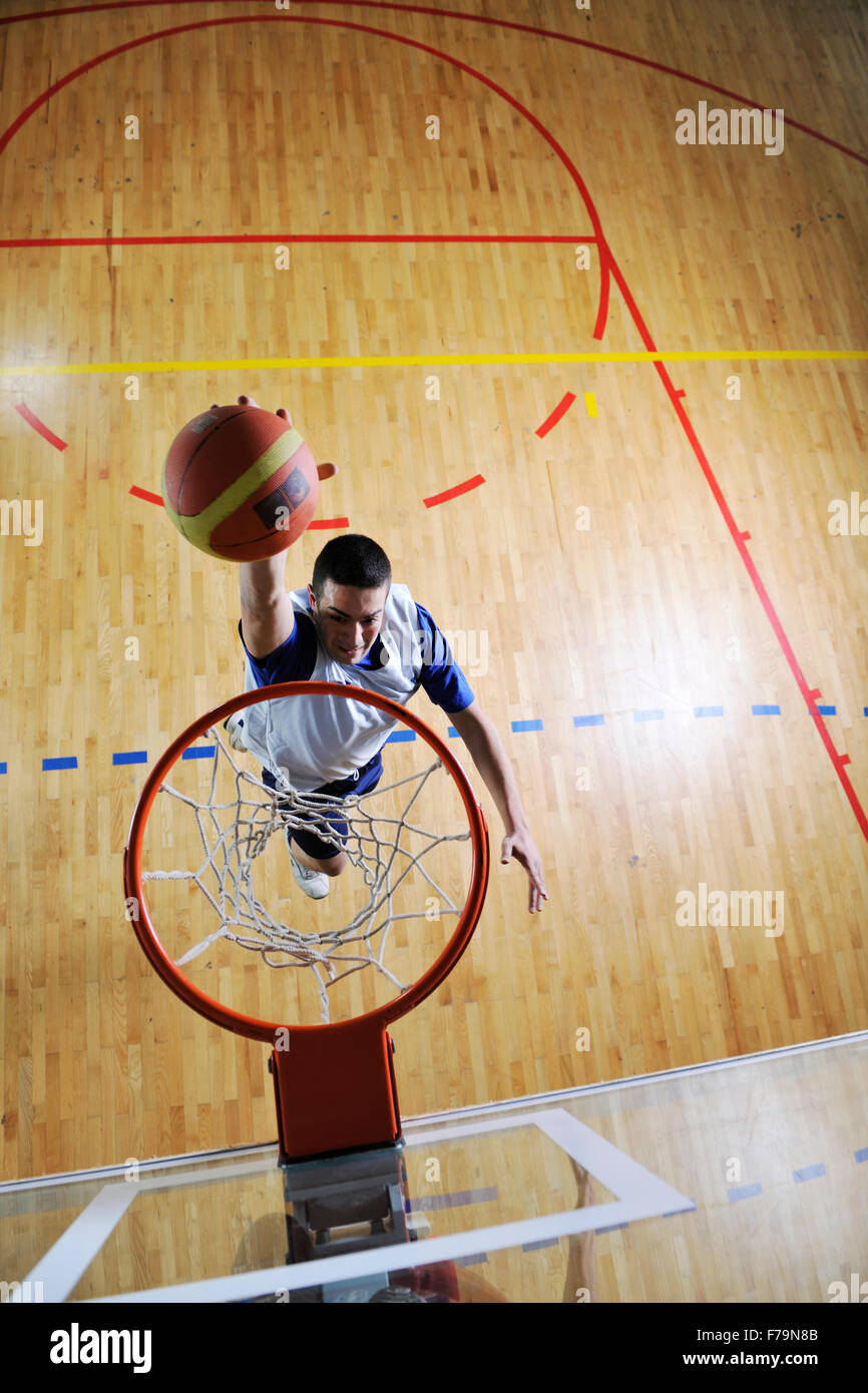 young healthy man play basketball game indoor in gym Stock Photo - Alamy