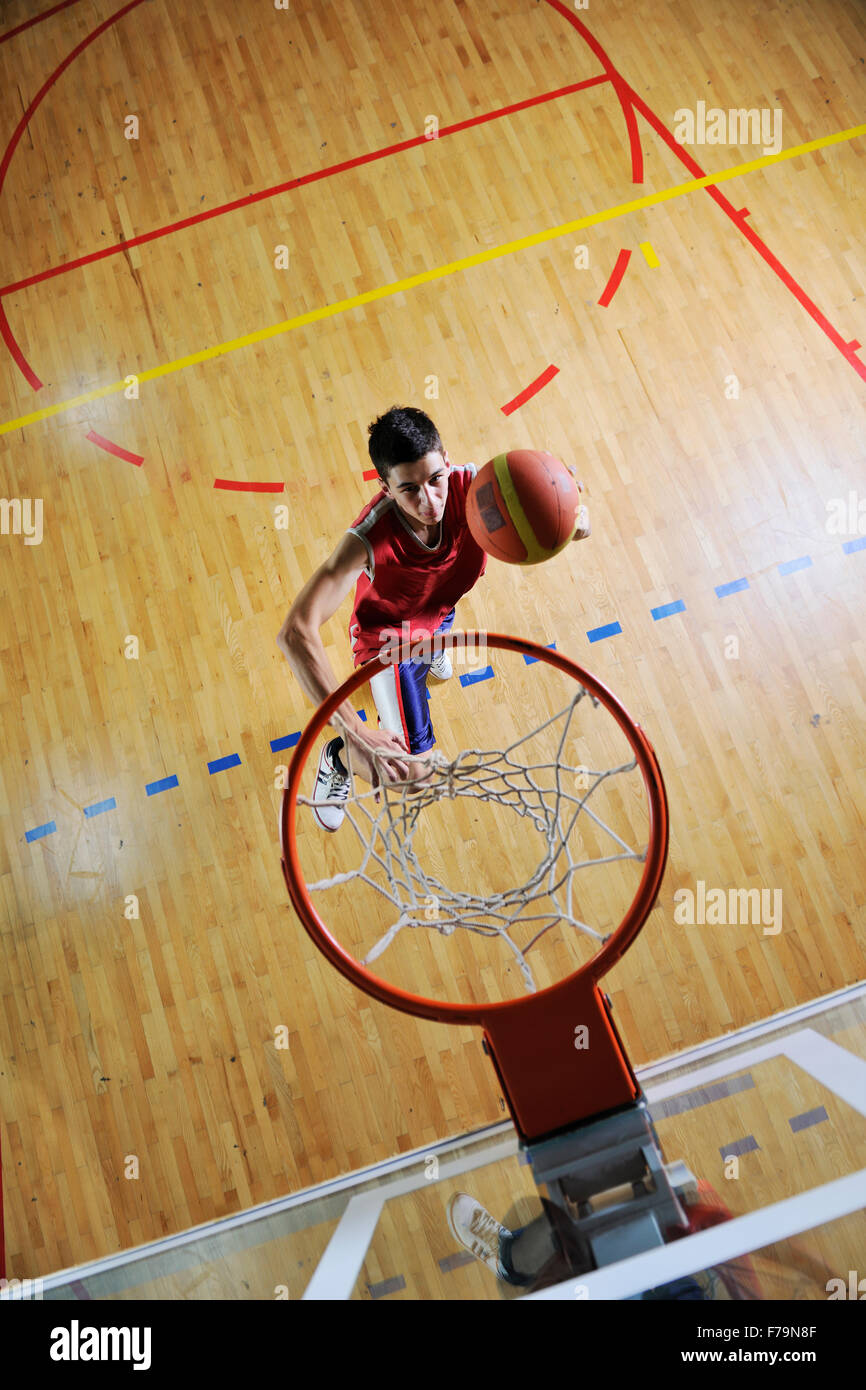 young healthy man play basketball game indoor in gym Stock Photo - Alamy