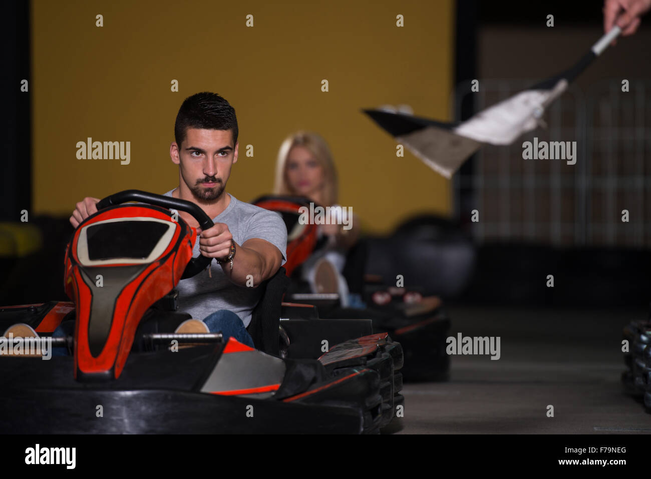 Group Of People Is Driving Go-Kart Car With Speed In A Playground ...