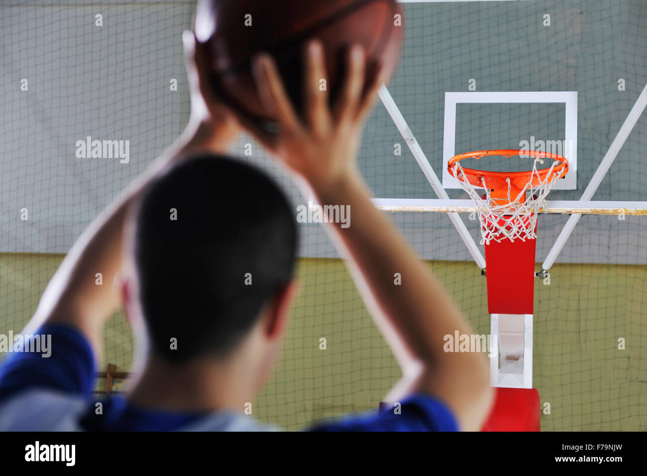 young healthy man play basketball game indoor in gym Stock Photo - Alamy