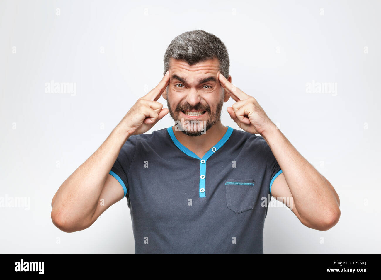 Unhappy angry headache temple beard hi-res stock photography and images ...
