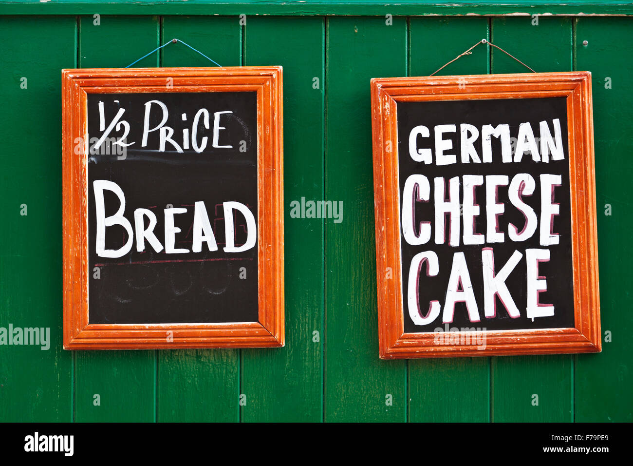 Signs outside shop in Borough Market, London, advertising half price ...