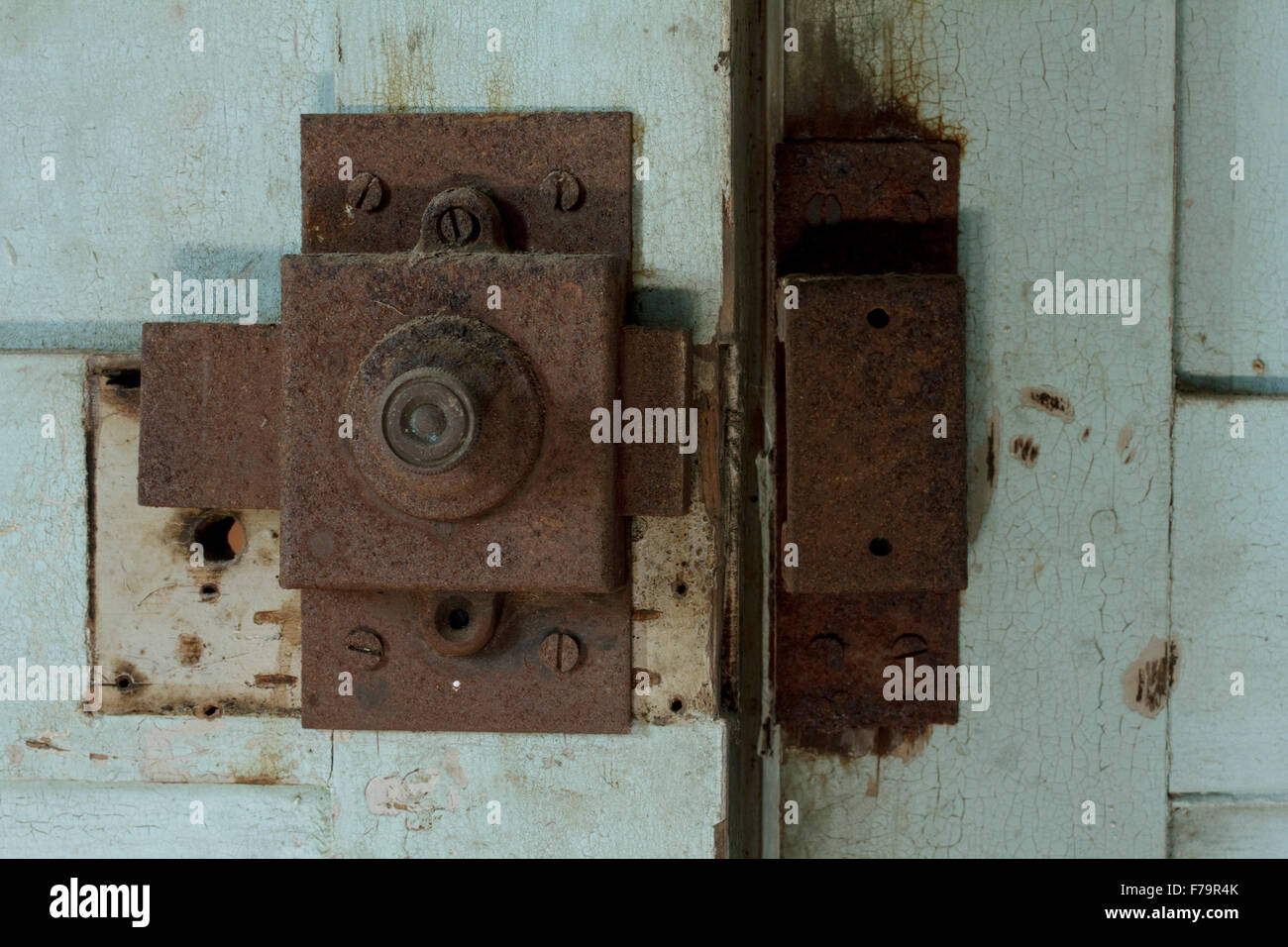 The rusty door lock from the 1st floor's twin-folded doors leading to ...