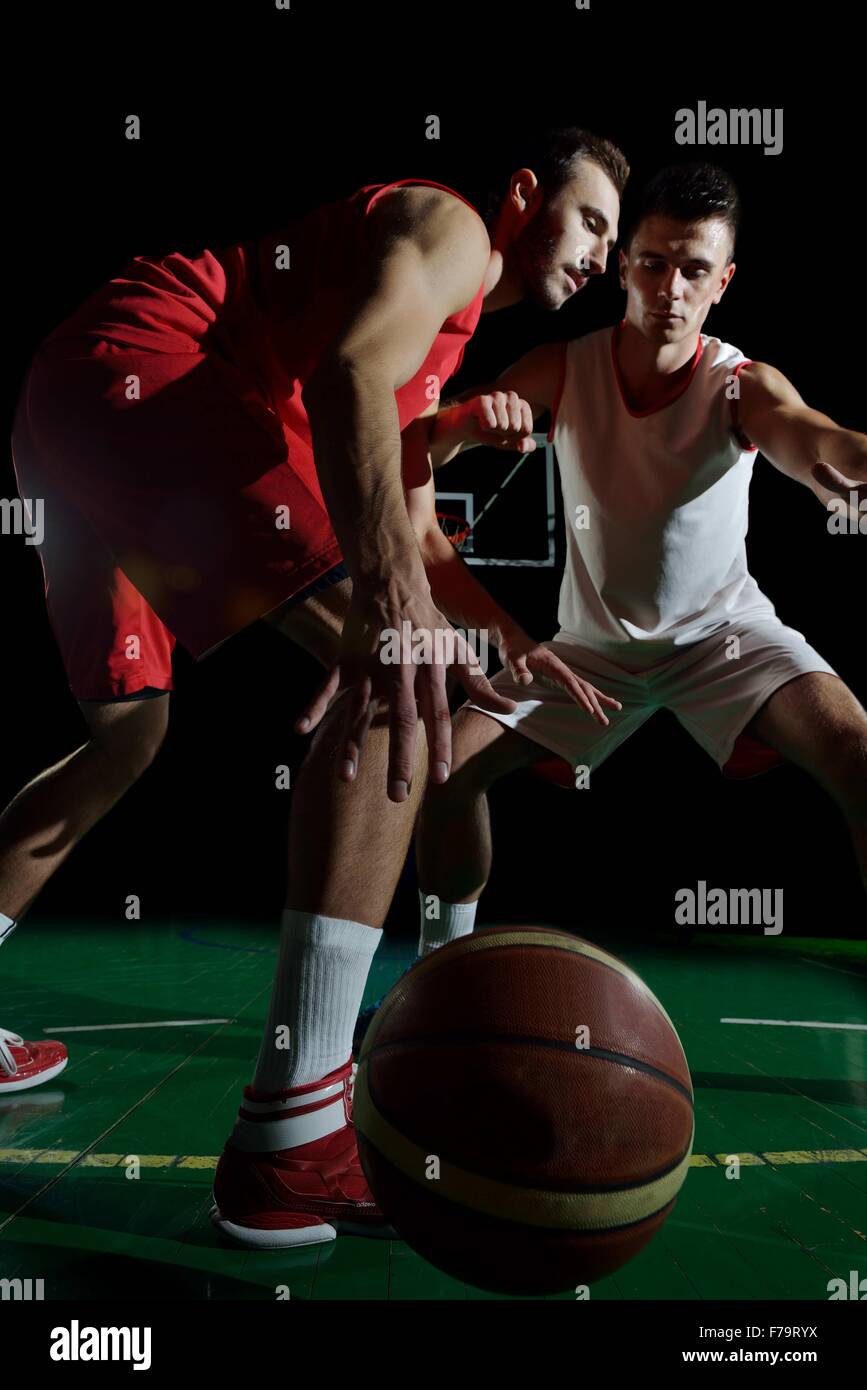 basketball game sport player in action isolated on black background ...