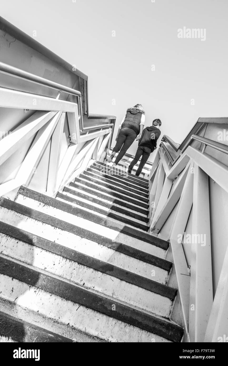 People climbing stairs hi-res stock photography and images - Alamy