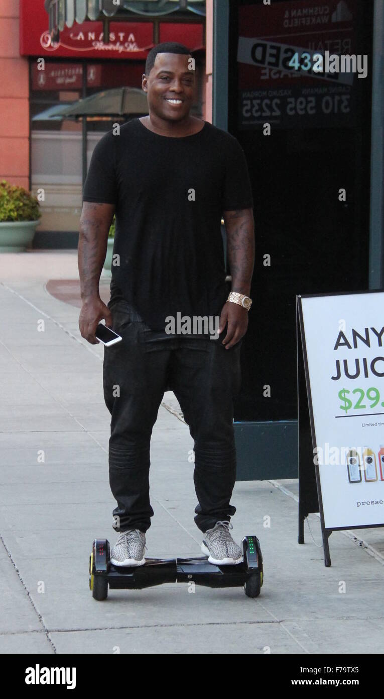 Won-G Bruny riding on his self balancing scooter in Bevery Hills ...