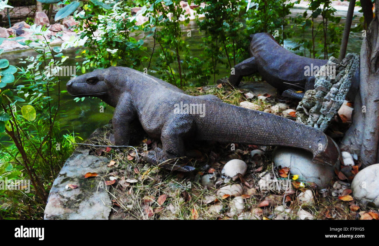 Two Reptiles Monument near Pond Stock Photo - Alamy