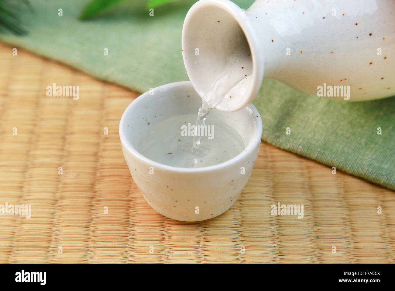 Japanese Sake pouring Stock Photo - Alamy