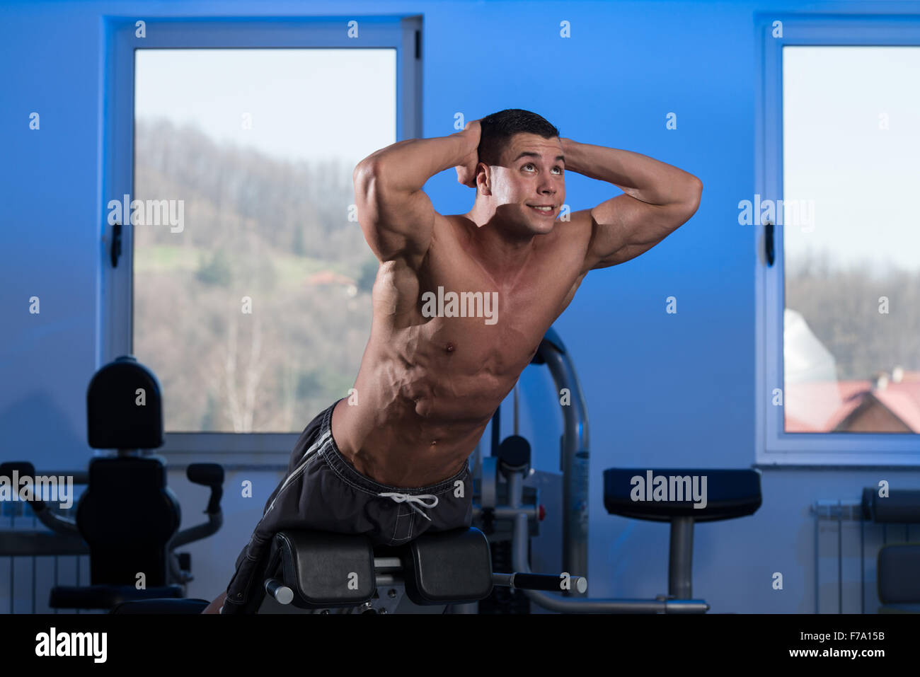 Bodybuilder Doing Heavy Weight Exercise For Back Stock Photo - Alamy