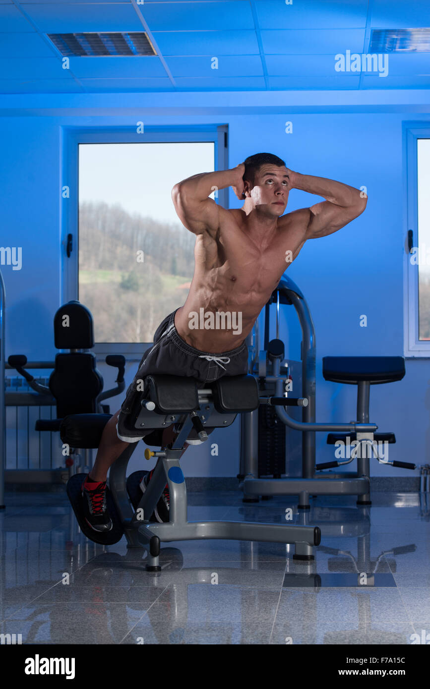 Bodybuilder Doing Heavy Weight Exercise For Back Stock Photo - Alamy