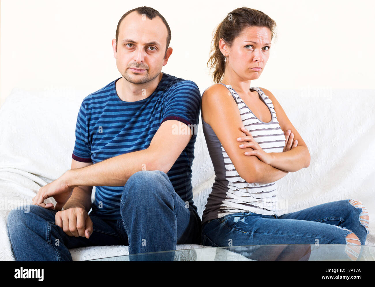 Young sad family sorting out their relationship Stock Photo - Alamy