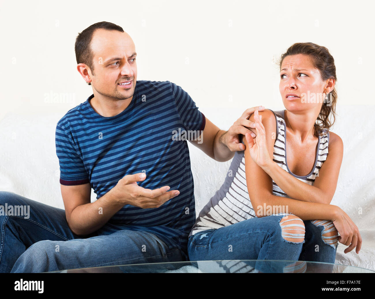 Family couple having a serious conversation at the home Stock Photo - Alamy