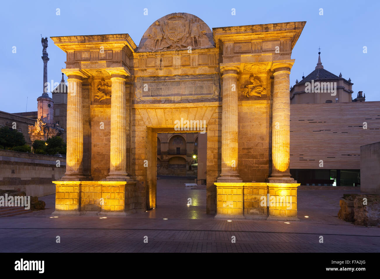 Gate of the Bridge in twilight. Cordoba, Spain Stock Photo - Alamy